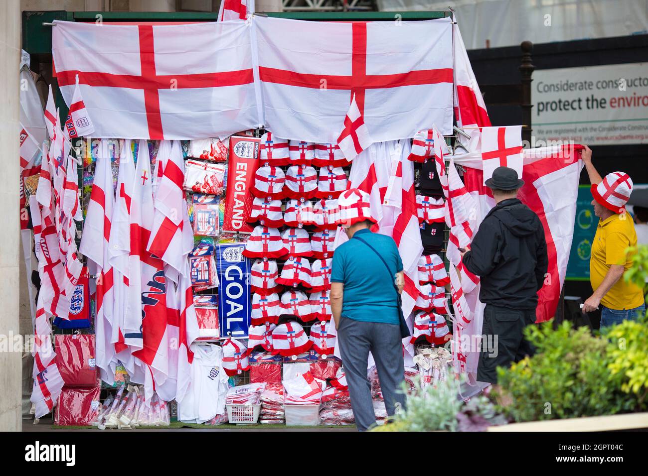 A vendor displays many England flags in central London, 10 July 2021 ...