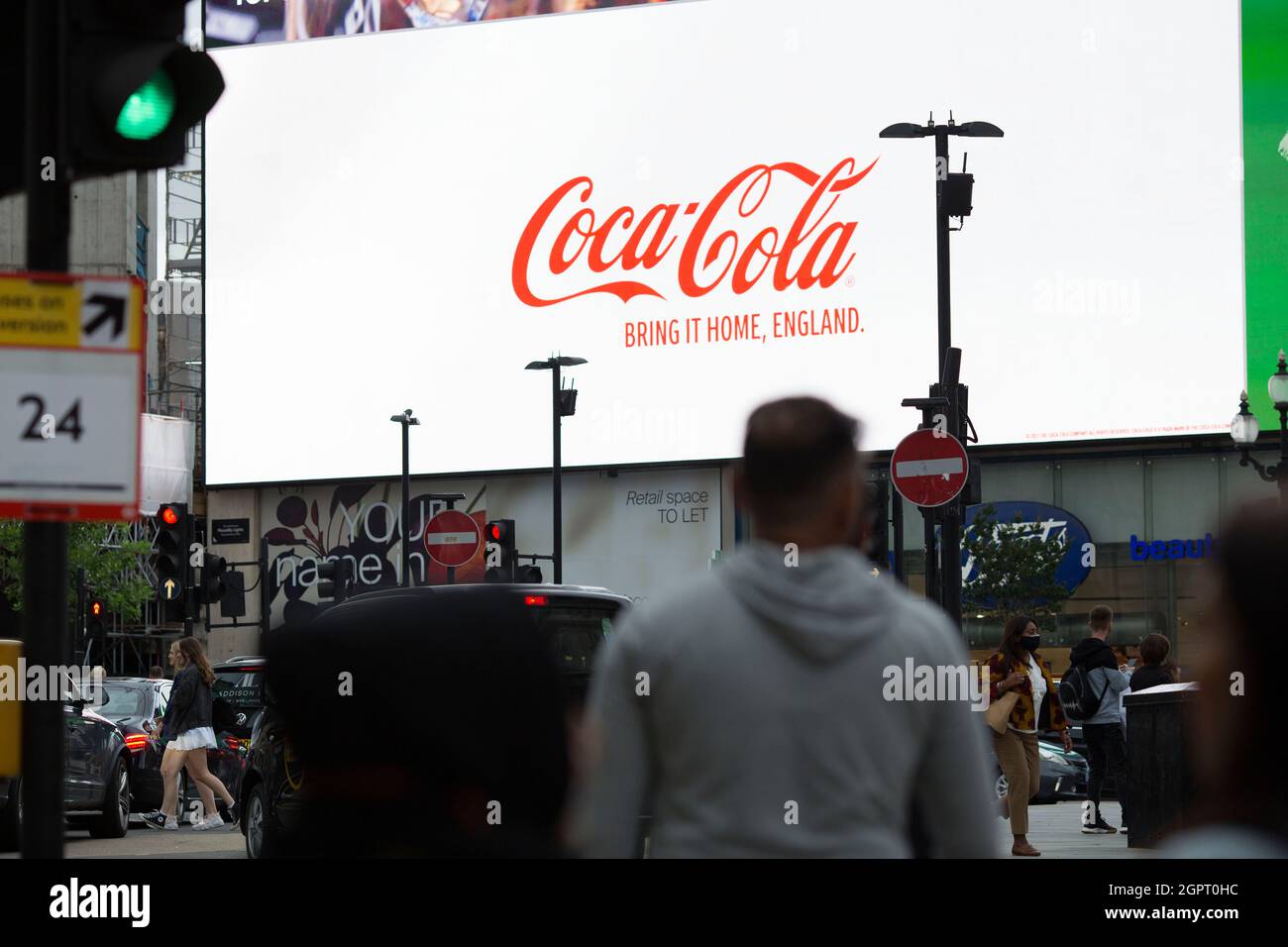 A Coca Cola advertisement supporting England is displayed on a large ...