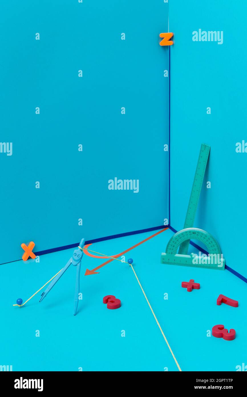 Math arrangement with calculator floating Stock Photo - Alamy