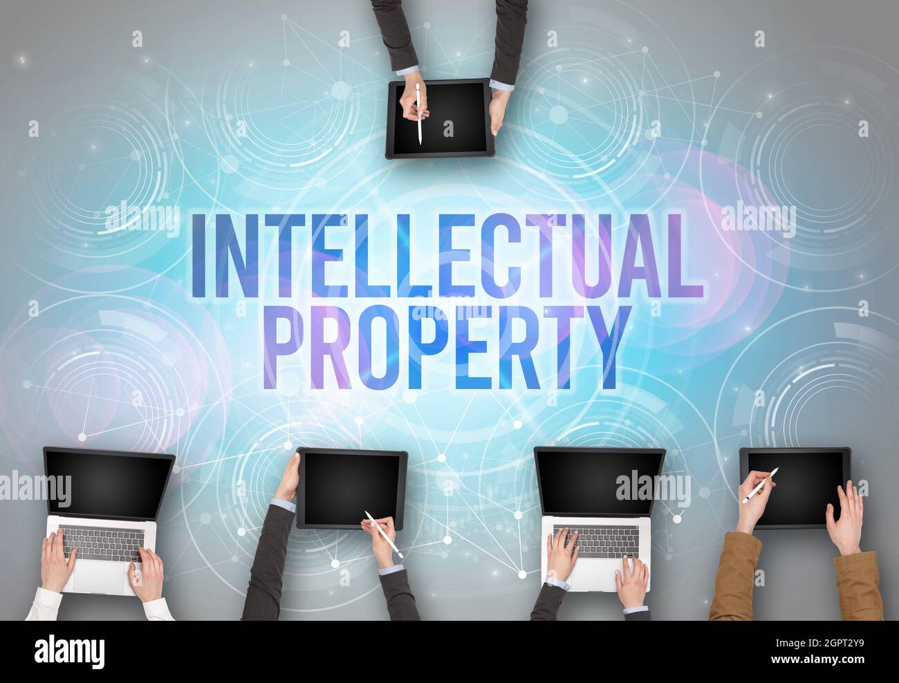 Group of people in front of a laptop, security concept Stock Photo - Alamy