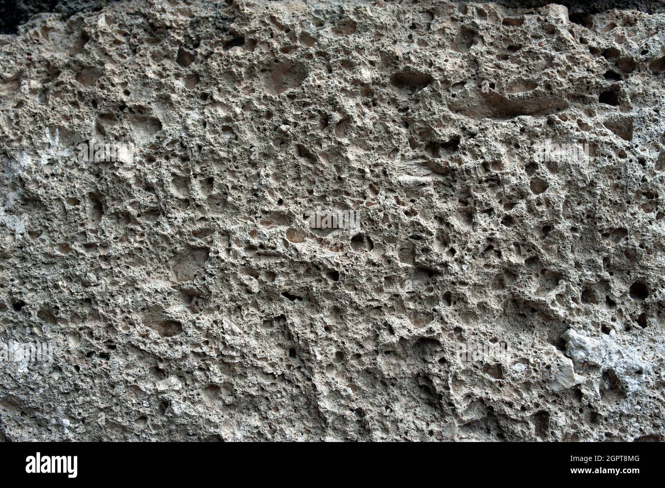 Brick, stone, asphalt ground, wall Stock Photo - Alamy
