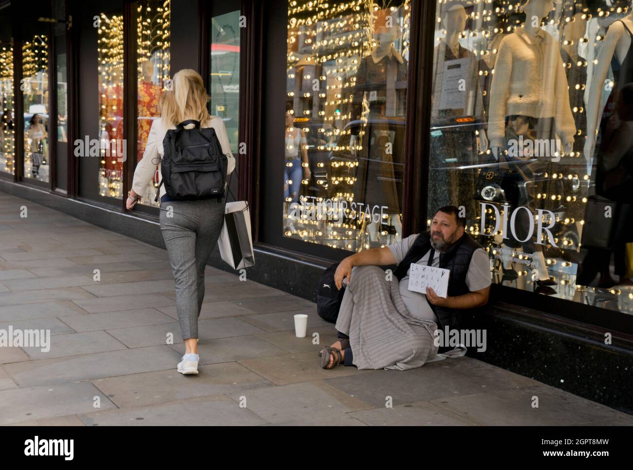 Homeless man begging outside world famous Harrods department store in ...