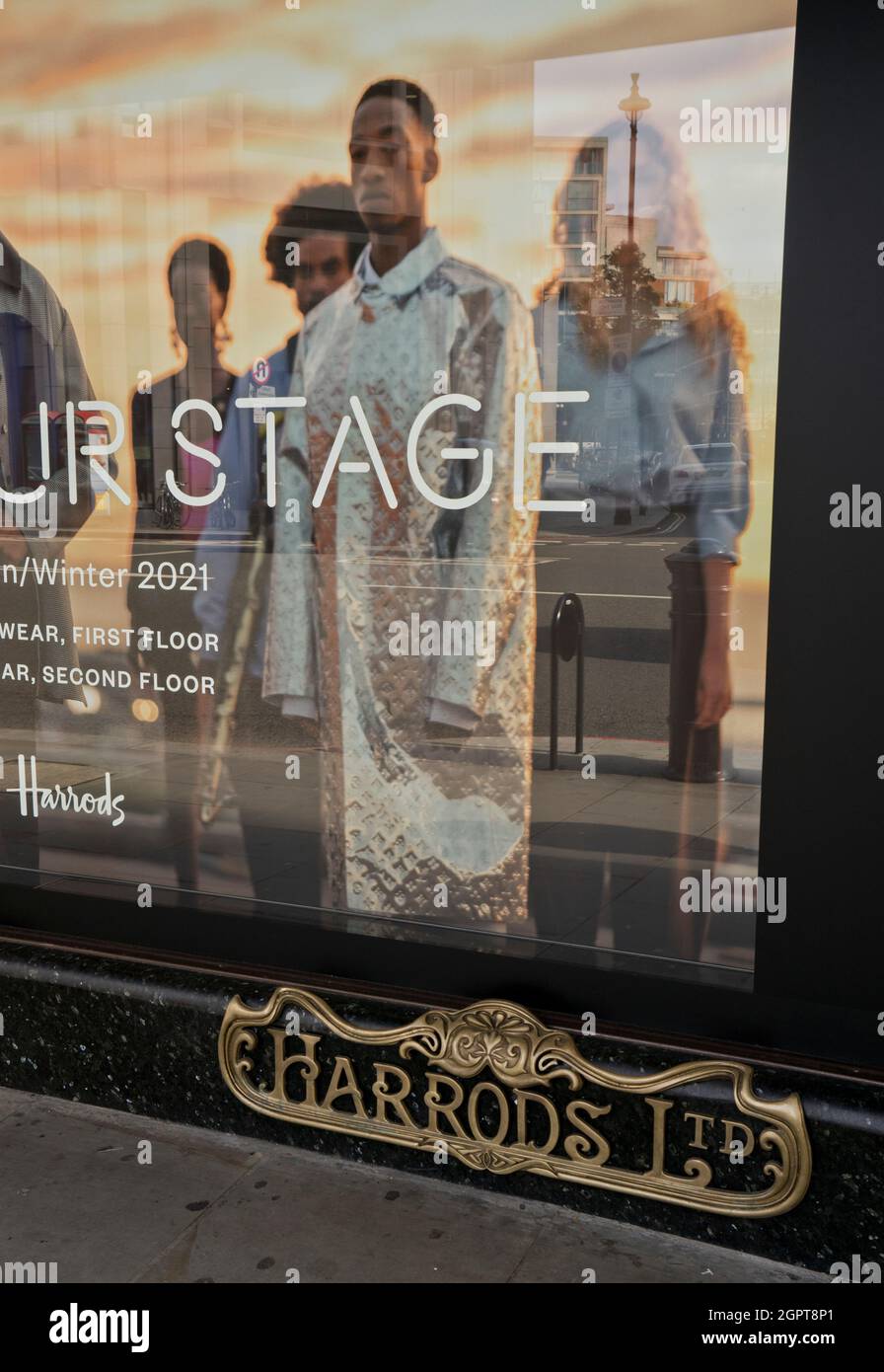 Window display with latest fashion at the world famous Harrods ...