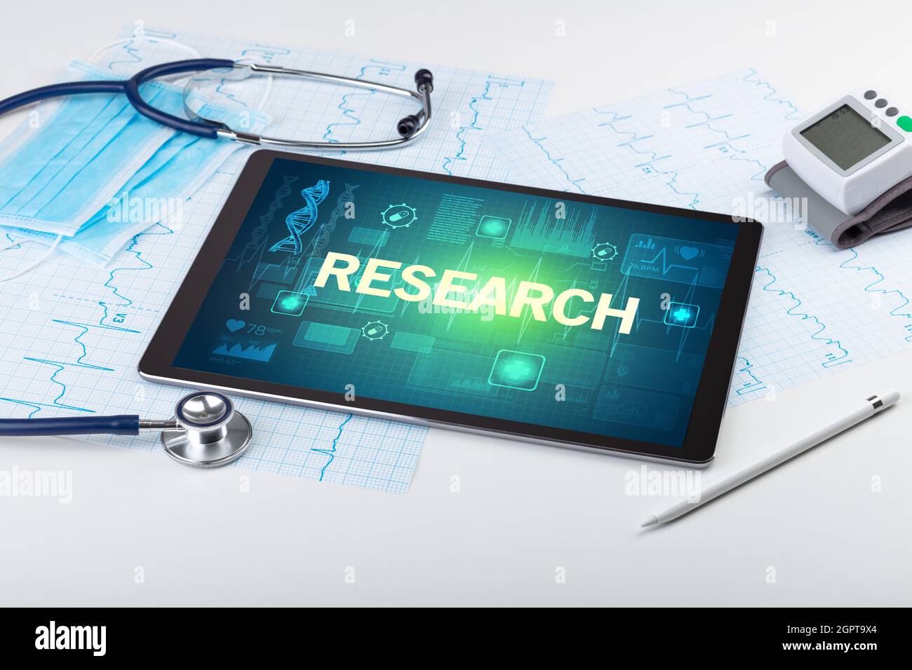 Tablet pc and medical stuff Stock Photo - Alamy