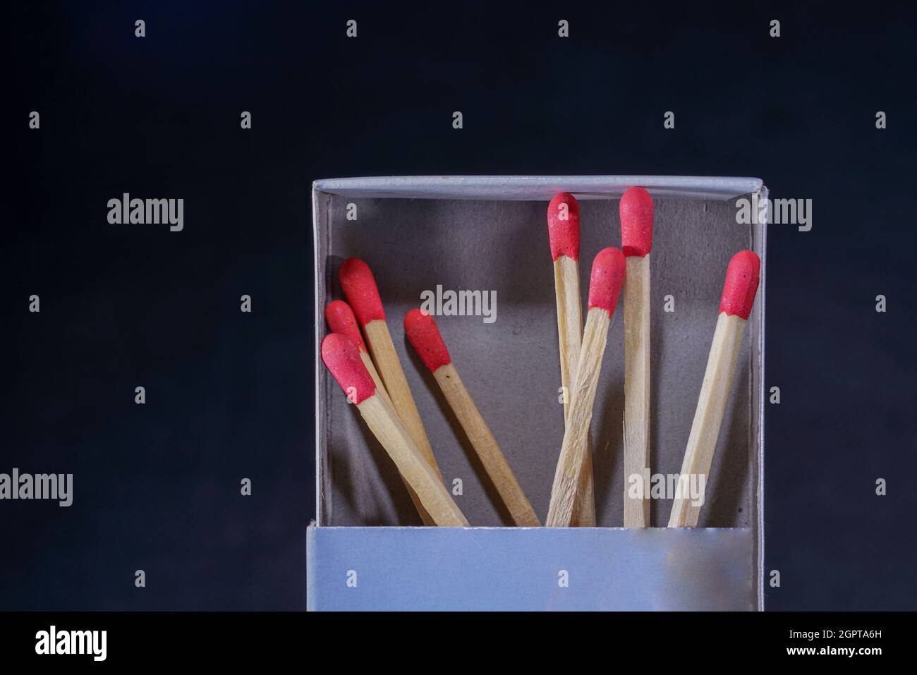 Lit matches and blown out in the studio photographed with colorful ...