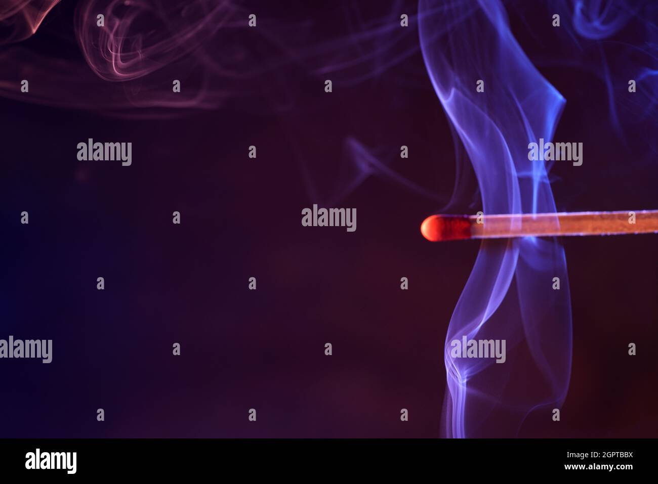 Lit matches and blown out in the studio photographed with colorful ...