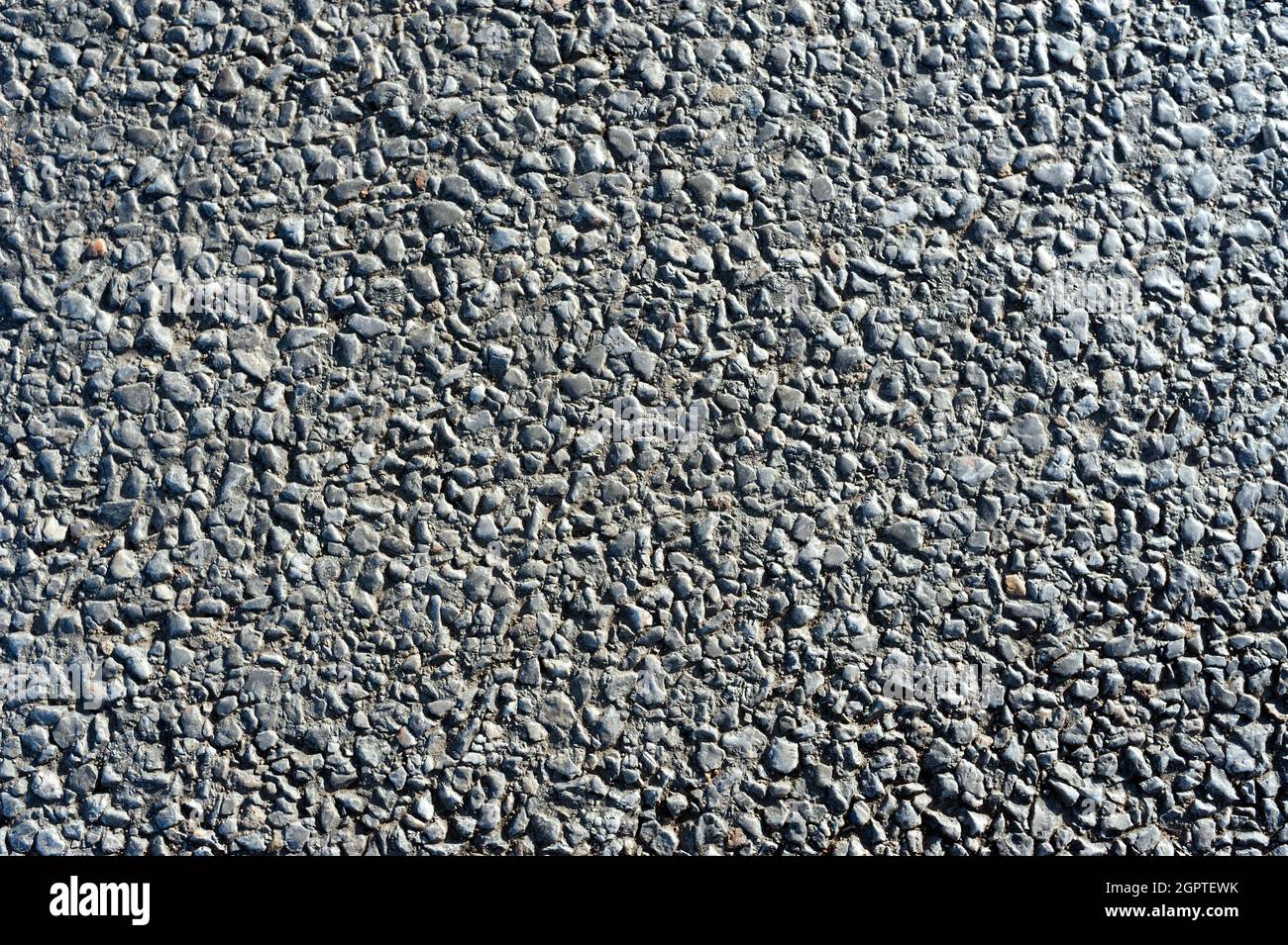 Brick, stone, asphalt ground, wall Stock Photo - Alamy