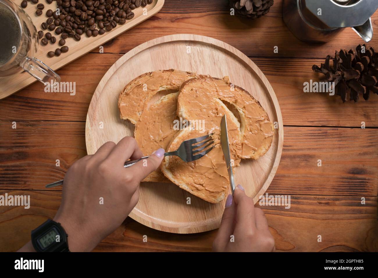 Woman eating peanut butter hi-res stock photography and images - Alamy