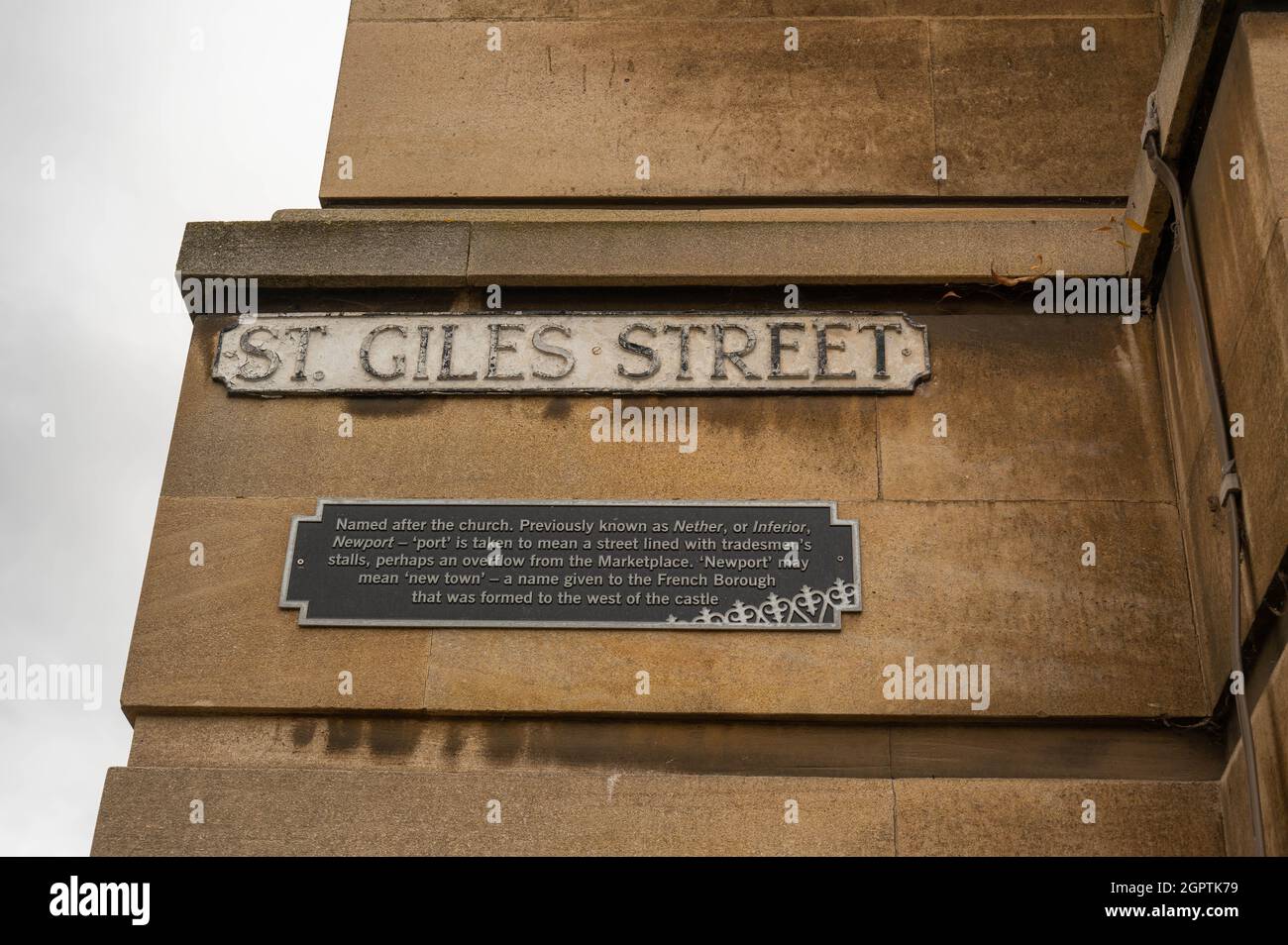 An original St.Giles Street sign with an infomation plaque below ...