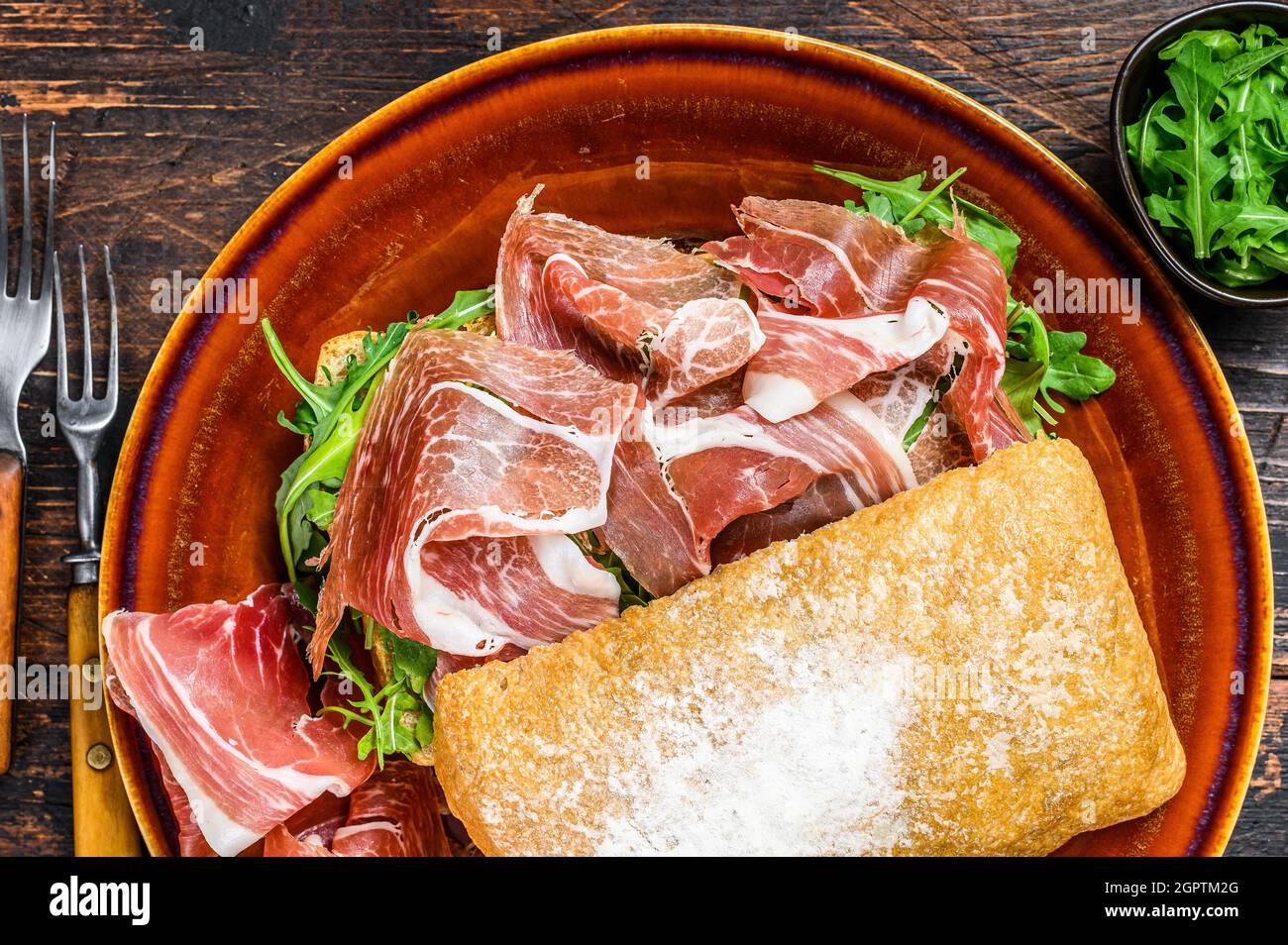 Spanish bocadillo de jamon, serrano ham sandwich on ciabatta bread with ...