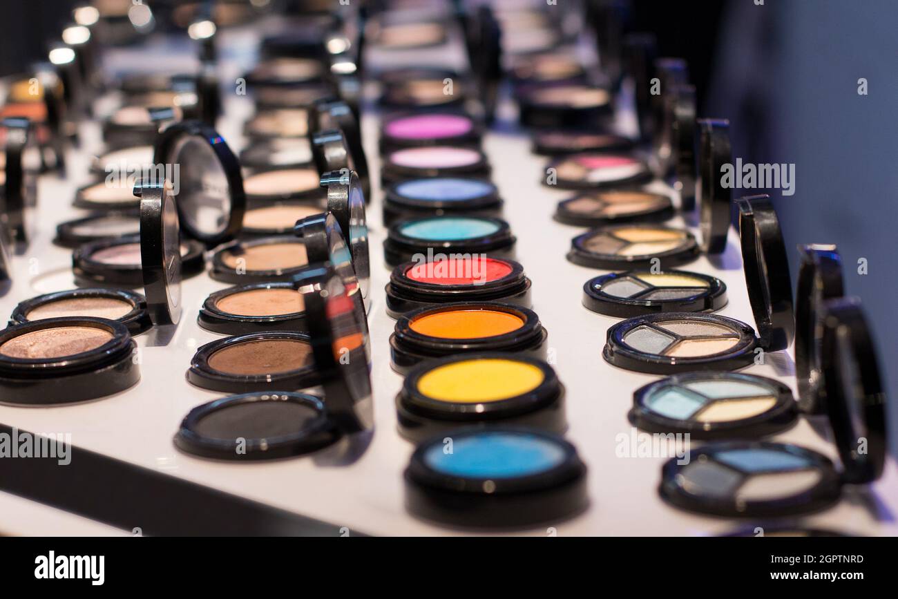 Different Colors Of Eye Shadow On The Shop Window In The Cosmetic Store different-colors-of-eye-shadow-on-the-shop-window-in-the-cosmetic-store