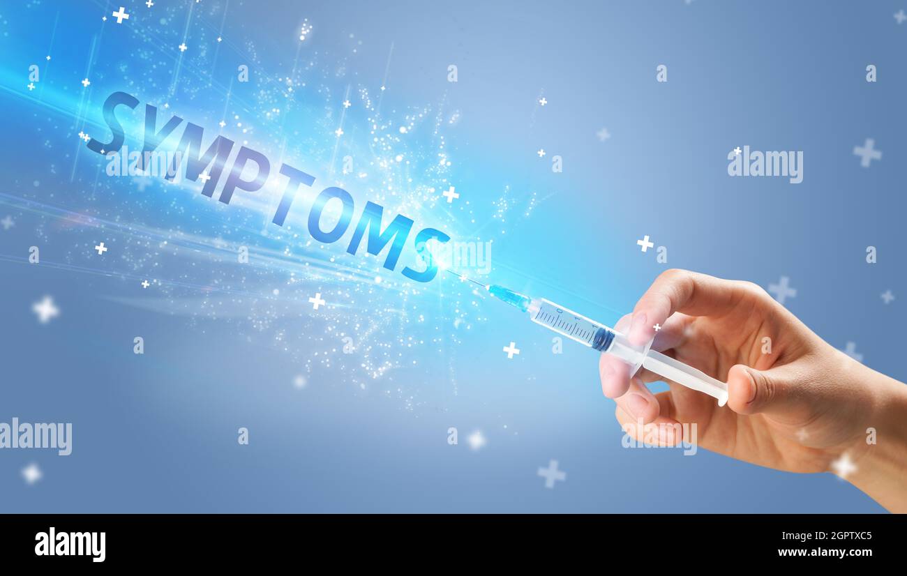 Syringe, medical injection in hand Stock Photo - Alamy