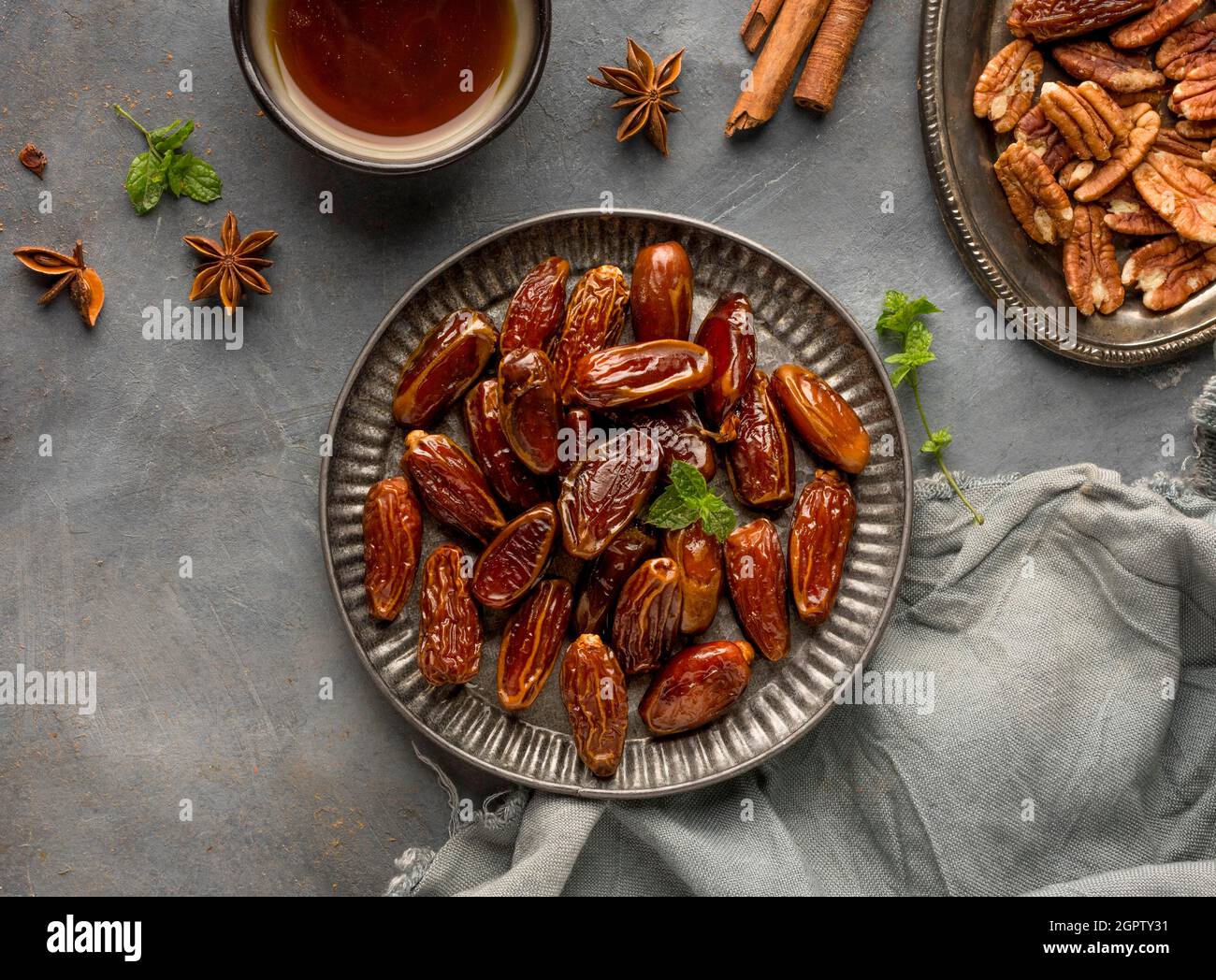 view dates nuts arrangement Stock Photo - Alamy