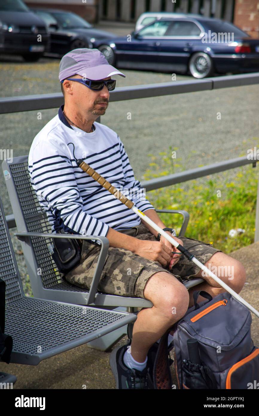 Man Sitting On The Bench Stock Photo - Alamy