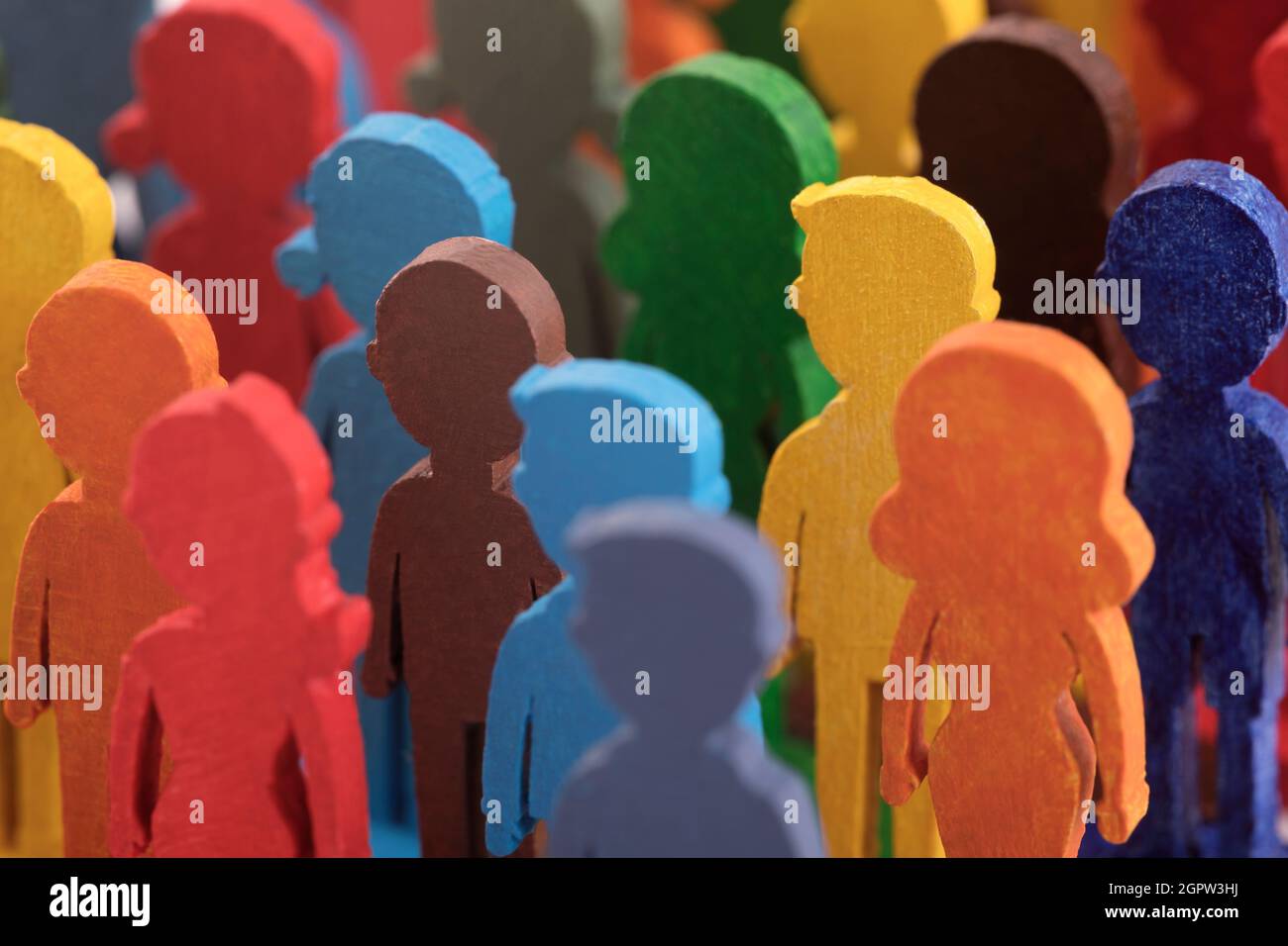 Colorful painted group of people figures Stock Photo - Alamy