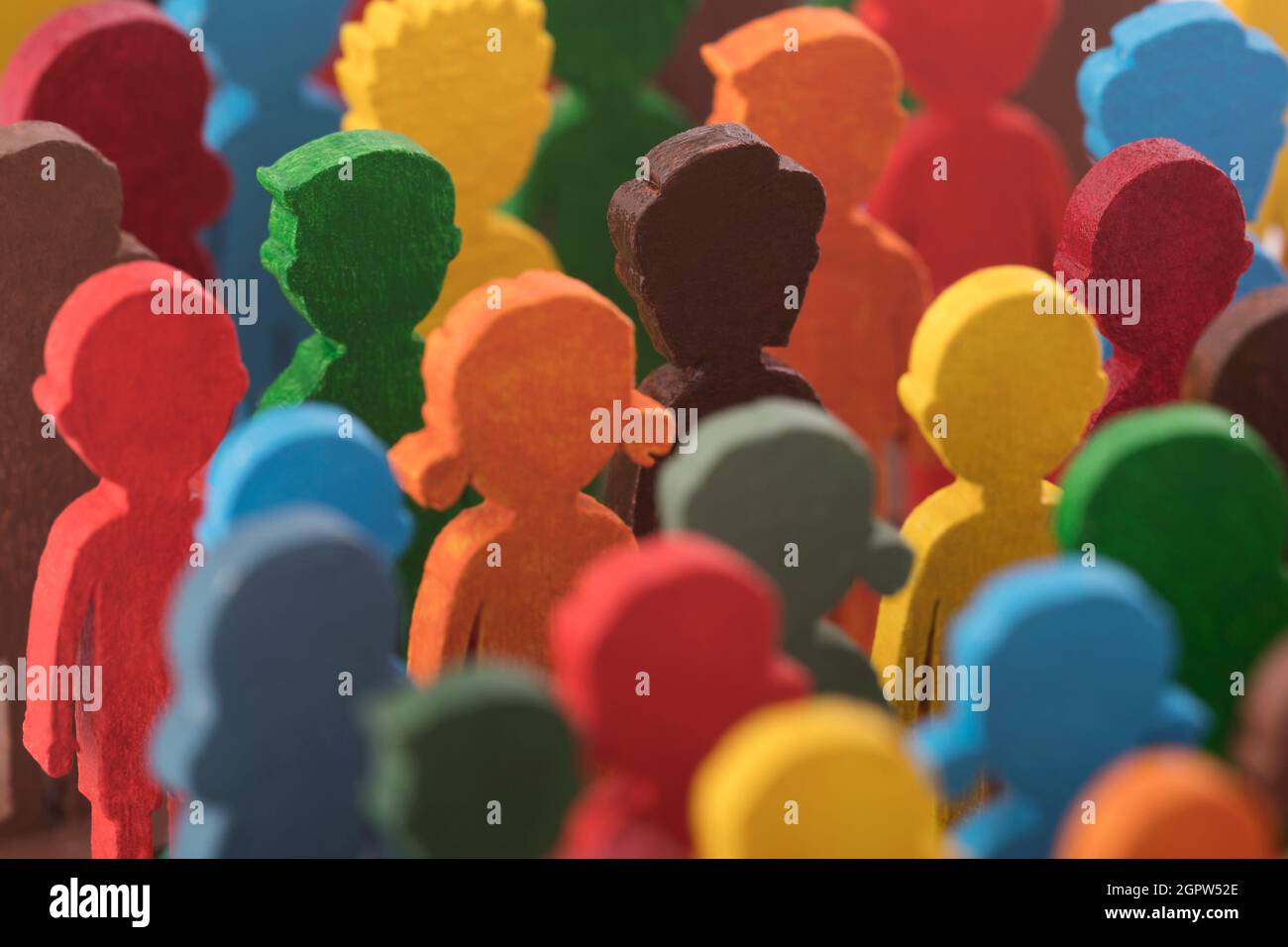Colorful painted group of people figures Stock Photo - Alamy