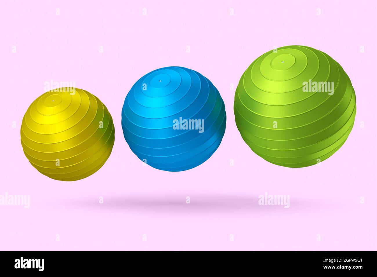Multicolor fitball or fitness ball isolated pink background. 3d ...