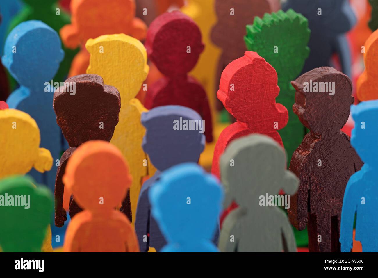 Colorful painted group of people figures Stock Photo - Alamy