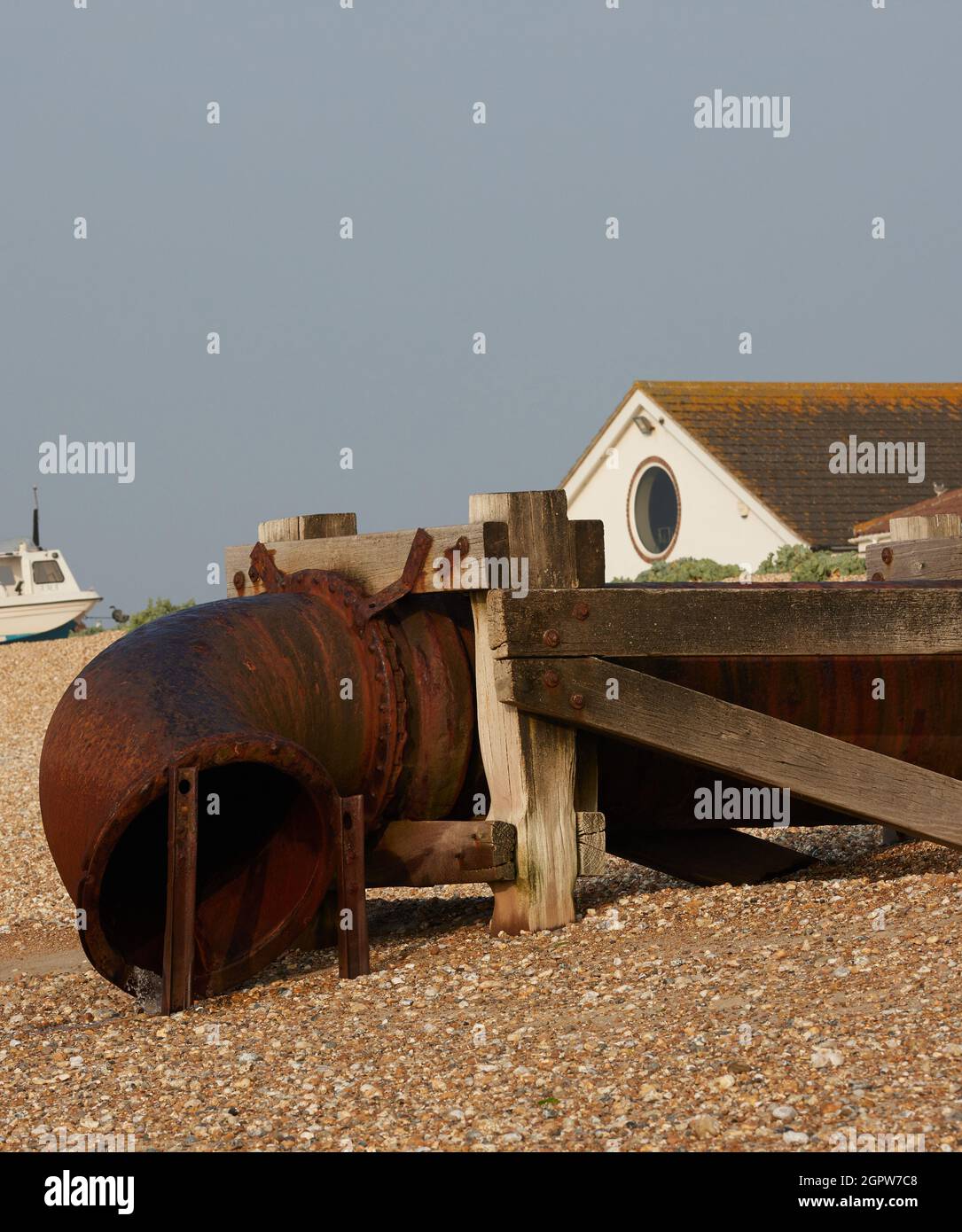 Large rusty water outlet seen on the beach of Aldham, UK in summer 2021 ...