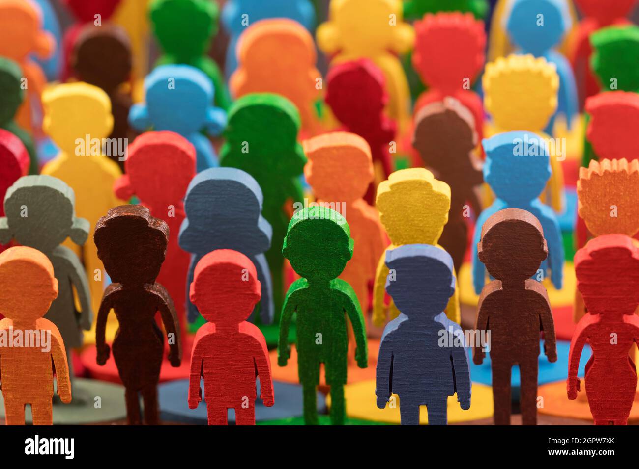 Colorful painted group of people figures Stock Photo - Alamy