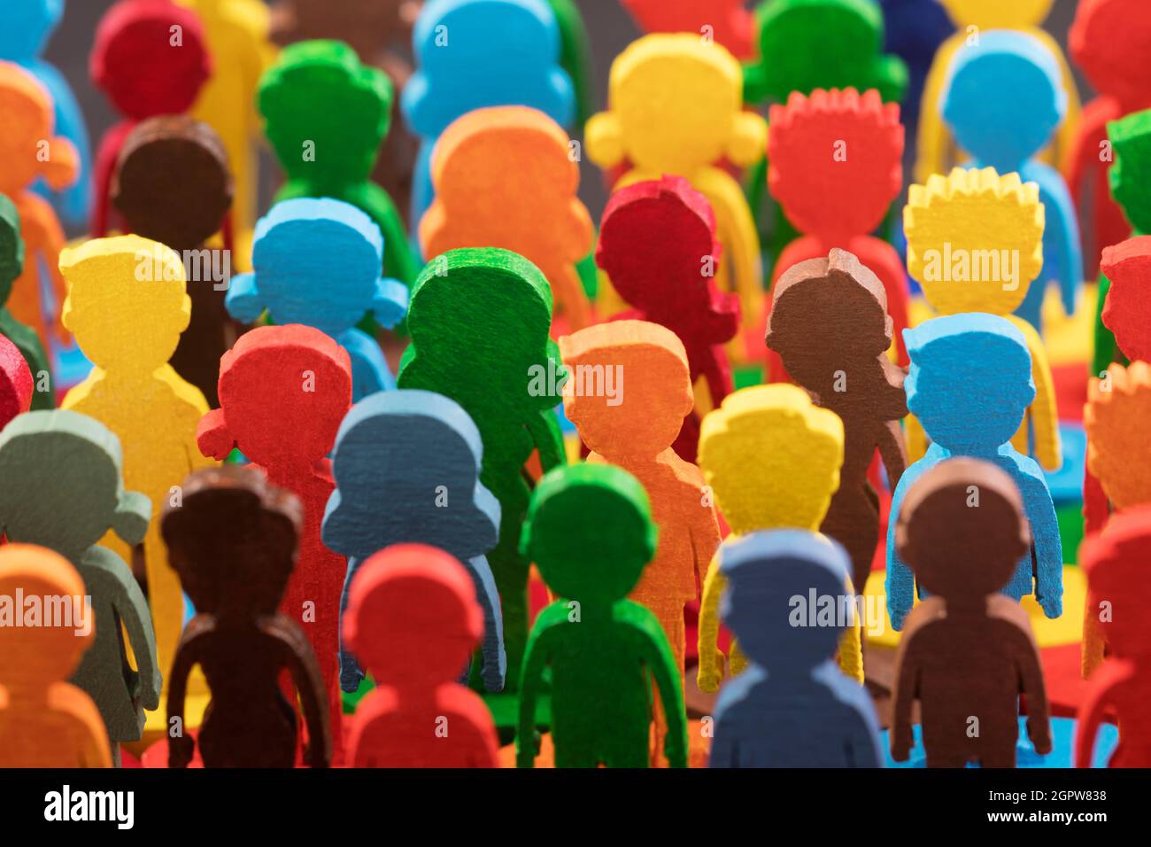 Colorful painted group of people figures Stock Photo - Alamy