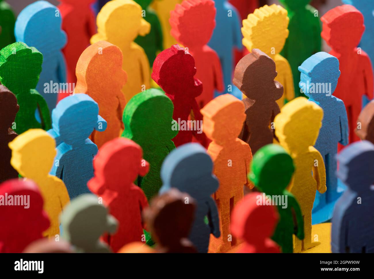 Colorful painted group of people figures Stock Photo - Alamy