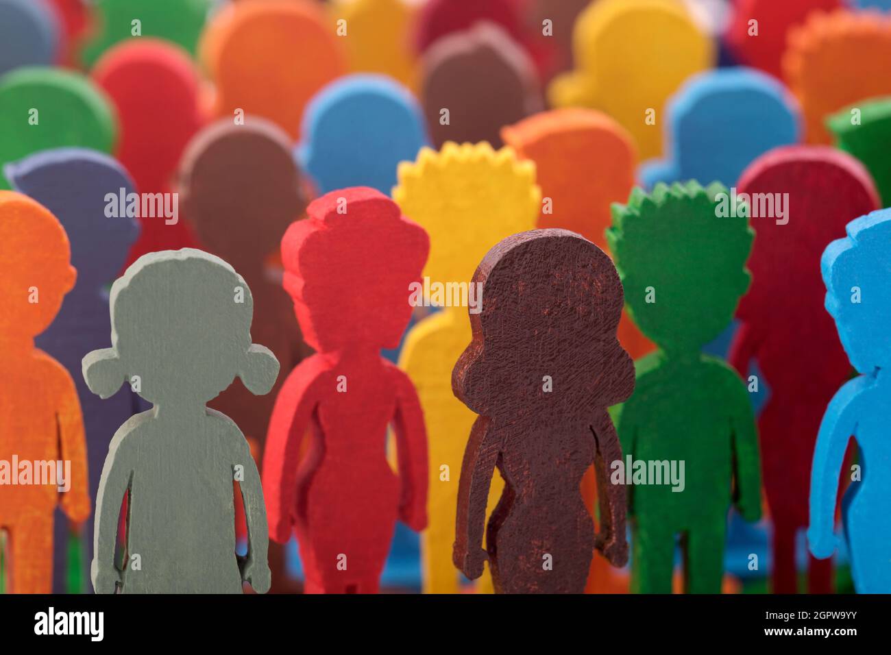 Colorful painted group of people figures Stock Photo - Alamy