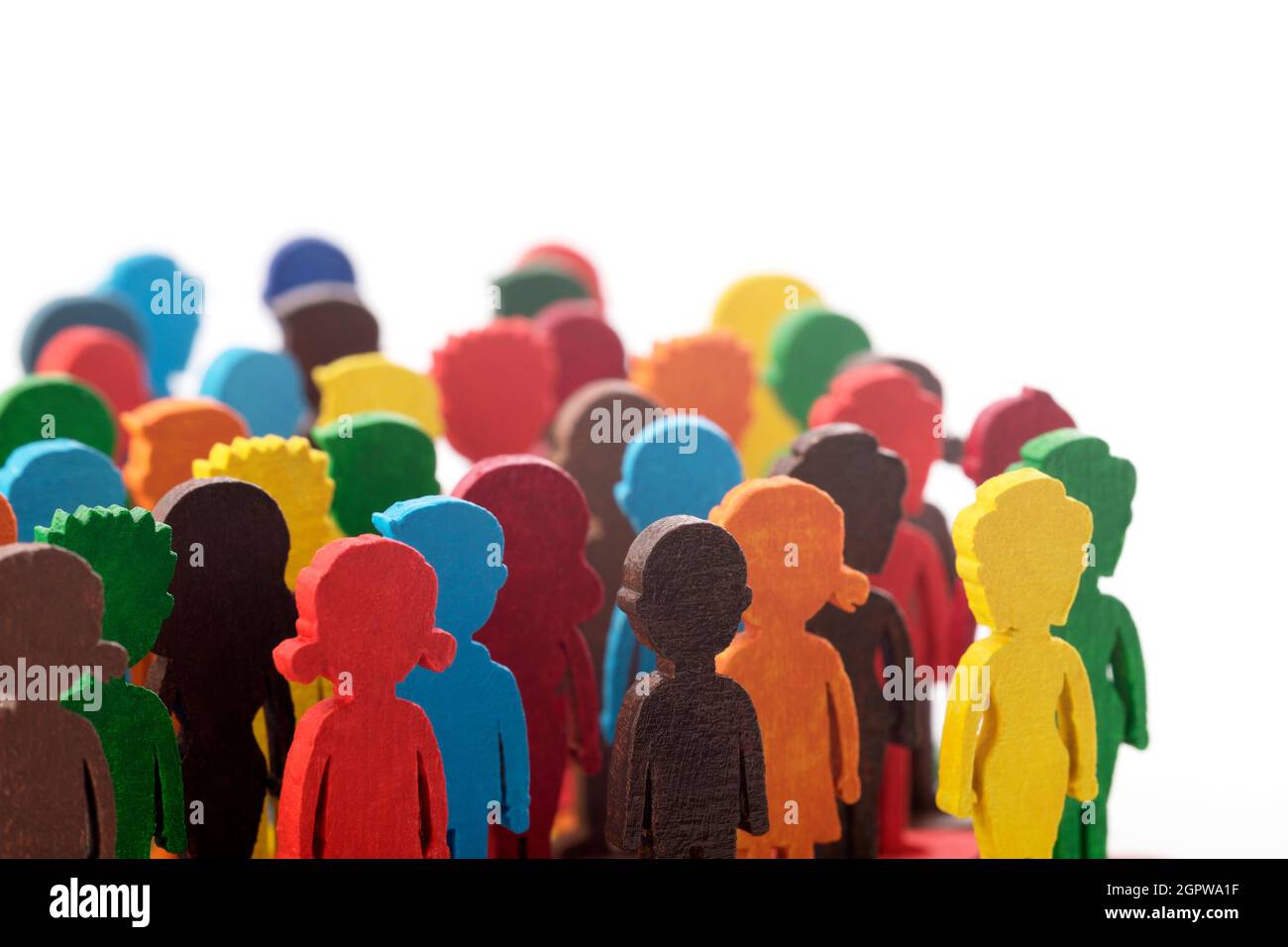 Colorful painted group of people figures Stock Photo - Alamy