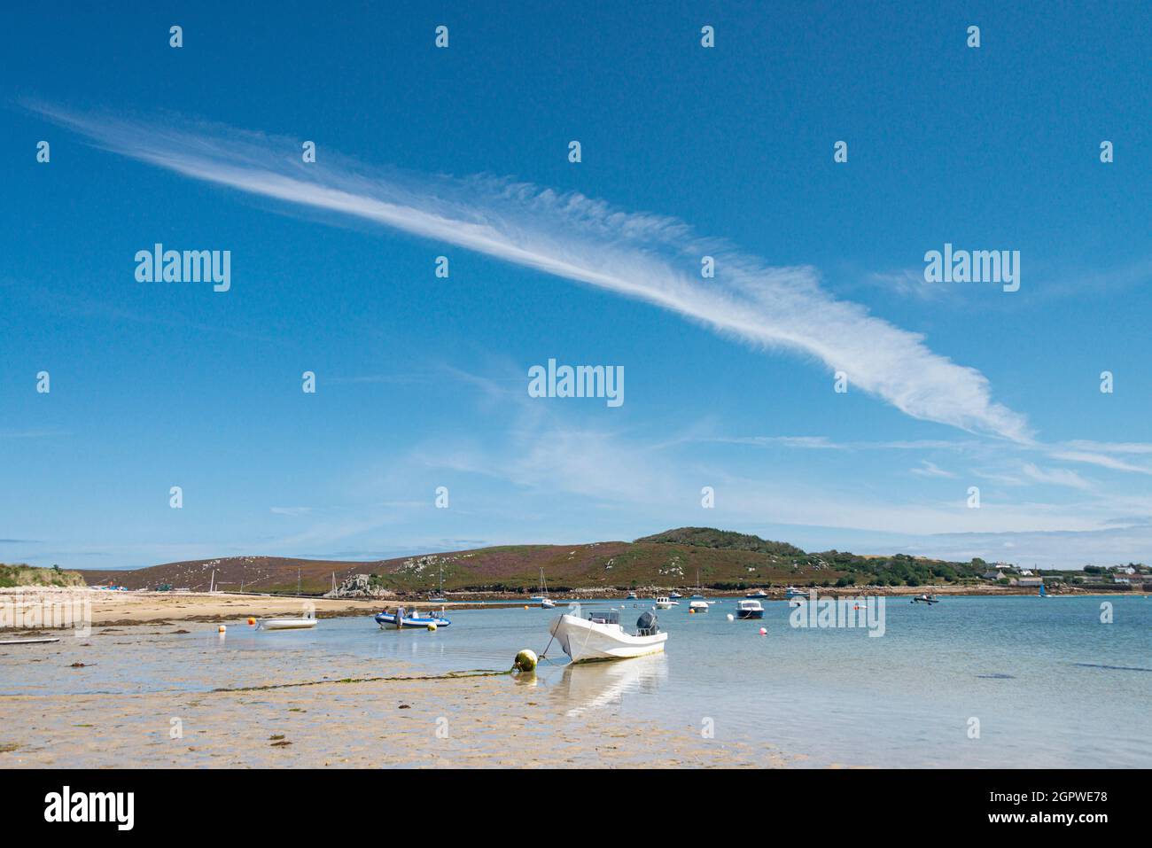 Boats in Green Bay, Bryher, Isles of Scilly, at low tide Stock Photo ...