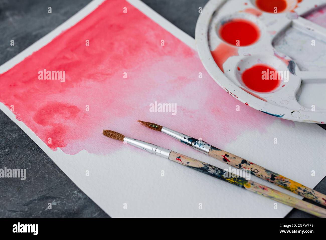Artist props collection on table Stock Photo - Alamy
