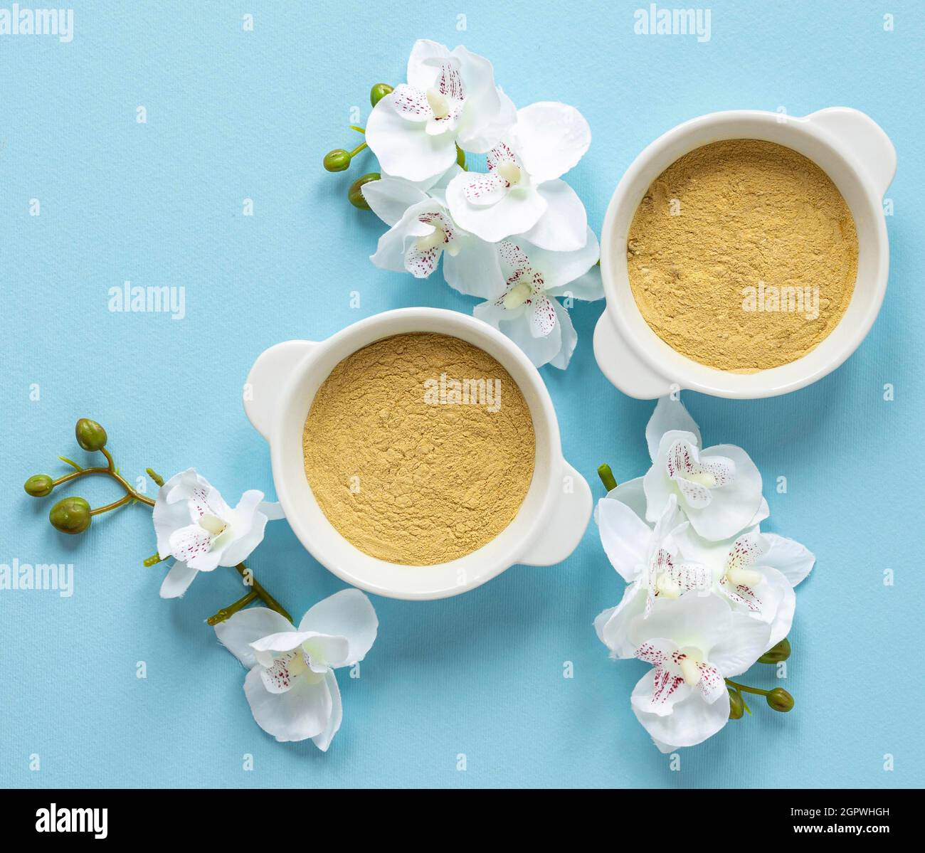 Natural spa coloured sand different bowls Stock Photo - Alamy