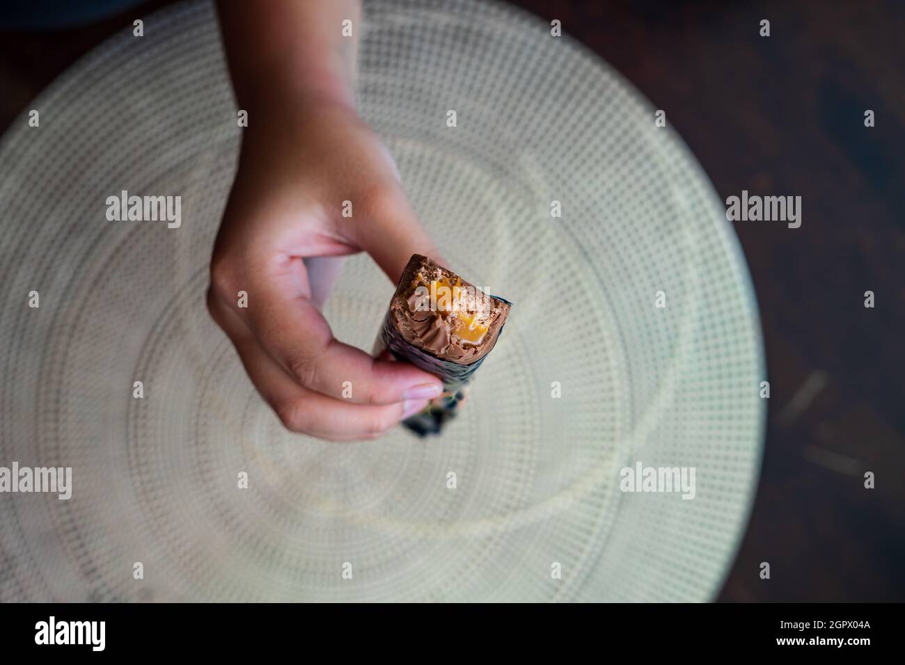 Hand holding snickers hi-res stock photography and images - Alamy