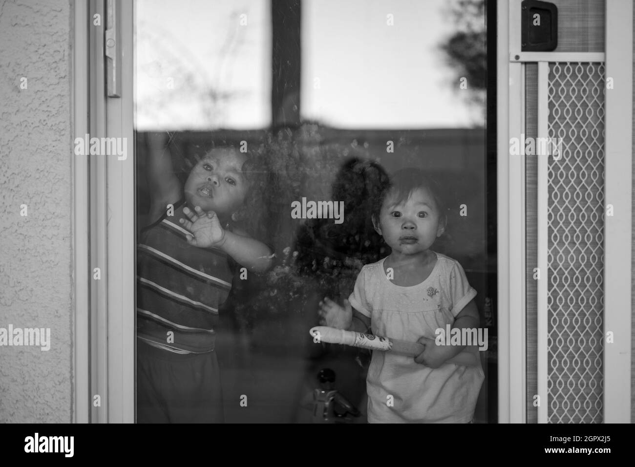 Girls face at window Black and White Stock Photos & Images - Alamy