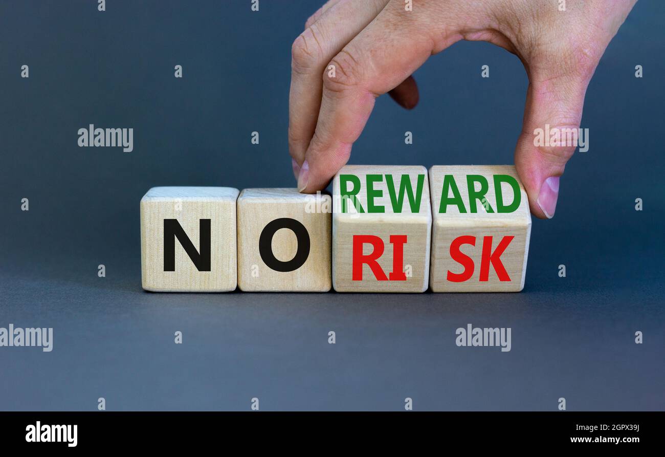 No risk or reward symbol. Businessman turns wooden cubes and changes ...