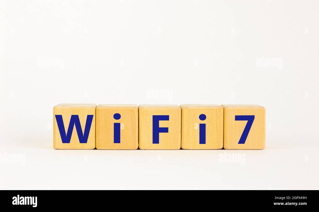 WiFi 7 symbol. The concept word WiFi 7 on wooden cubes. Beautiful white ...