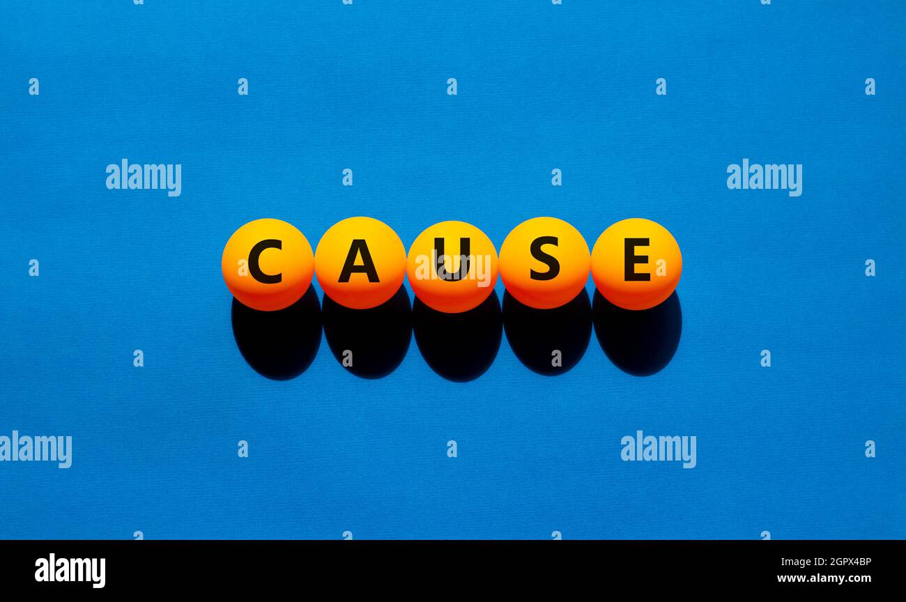 Cause symbol. The concept word 'cause' on orange table tennis balls ...