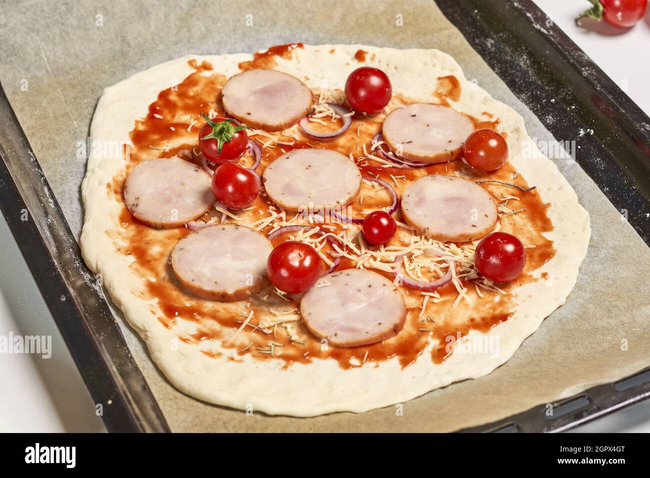 Process of making homemade pizza Stock Photo - Alamy