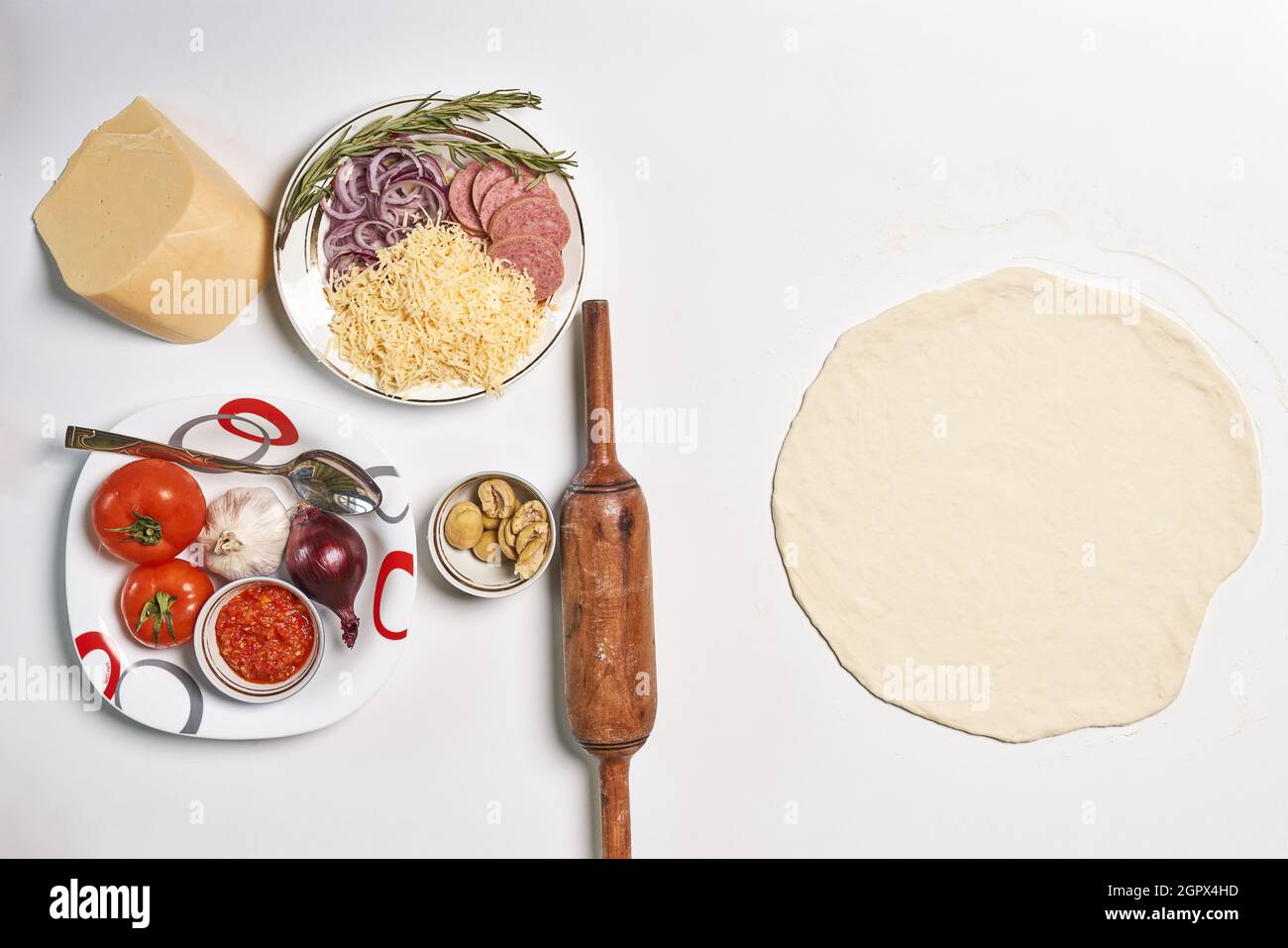 Top view of pizza ingredients isolated on white background Stock Photo ...