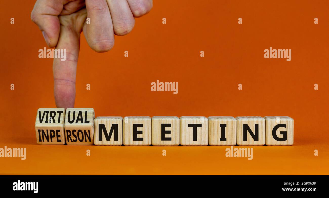Virtual or inperson meeting symbol. Businessman turns cubes, changes ...