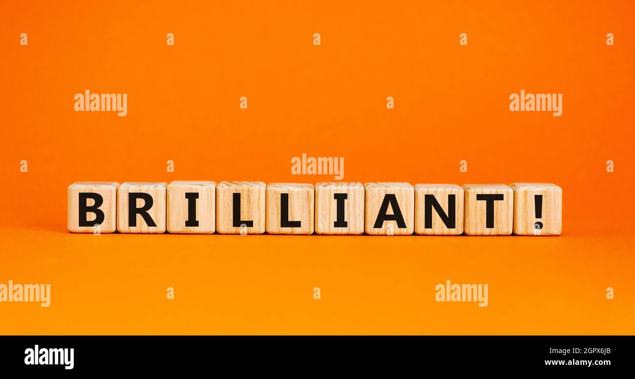 Brilliant symbol. The word brilliant on wooden cubes. Beautiful orange ...