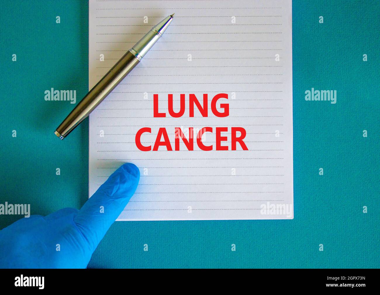 Lung cancer symbol. White note with words Lung cancer, beautiful blue ...