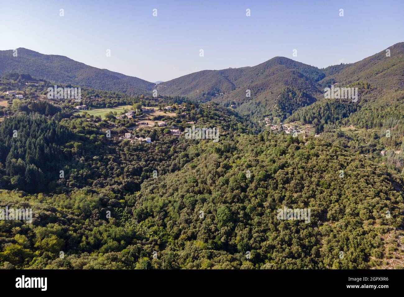 Aerial view of the village of Soudorgues in the Cevennes mountains ...