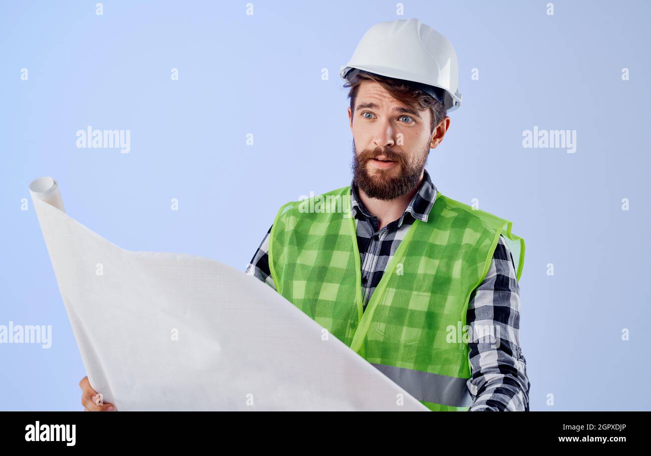 male builder with documents and drawings blueprints studio industry ...