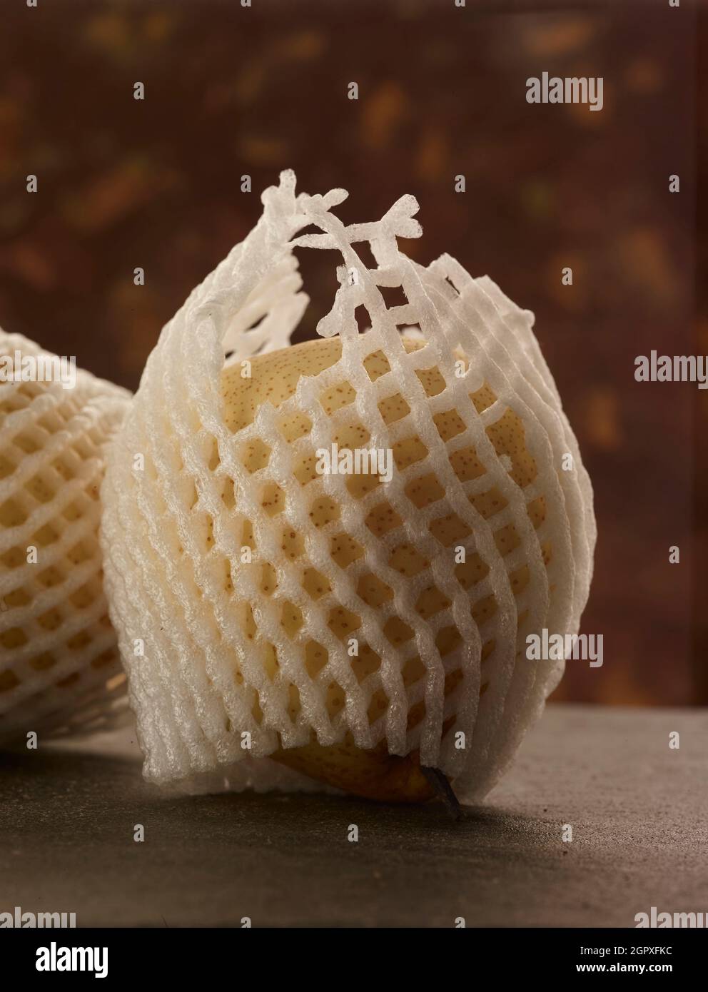 Still-life in close-up of juicy sweet Chinese white pear, Pyrus × ...