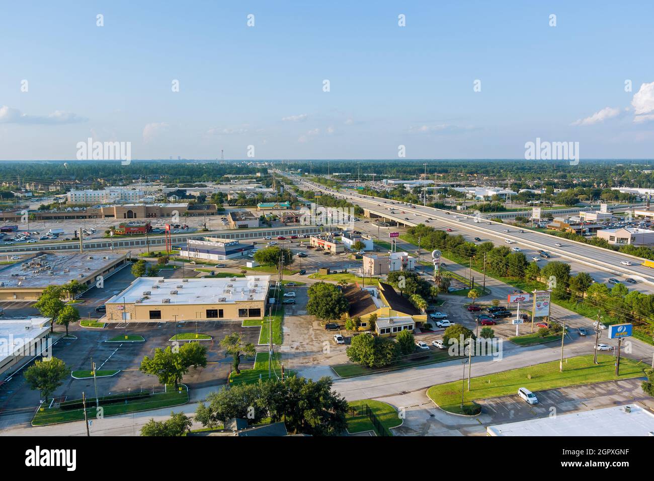 Aerial top view of typical a Houston city Texas shopping center with ...
