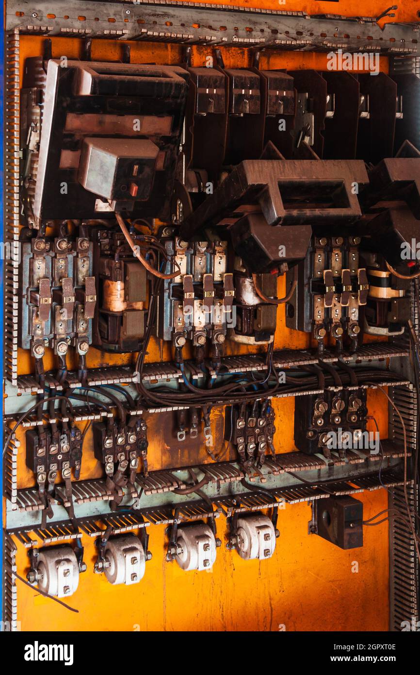 Electrical panel of an abandoned assembly plant. Rusty electrical ...