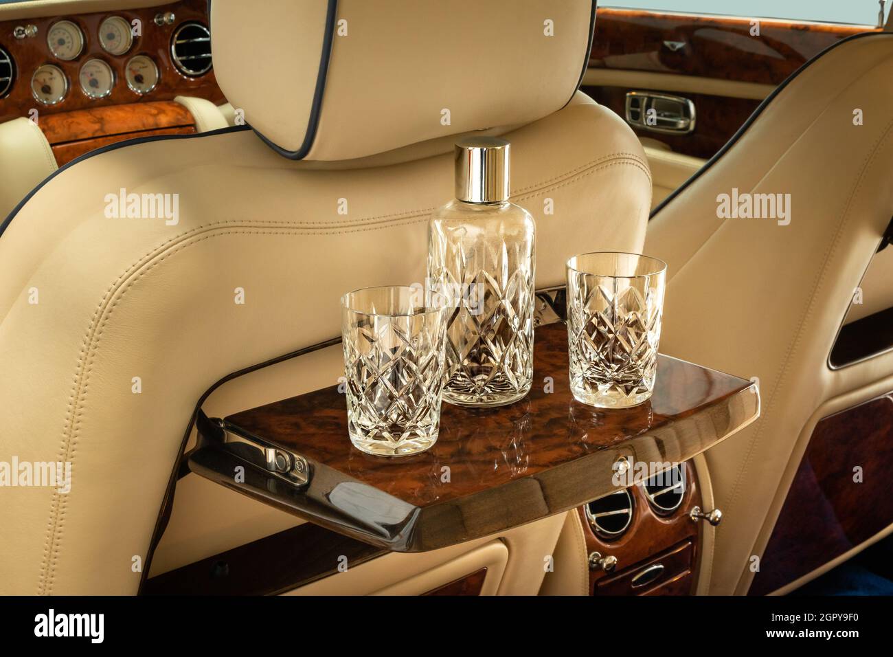 Drop down table with decanter and glasses in a 2006 Bentley Arnage R ...