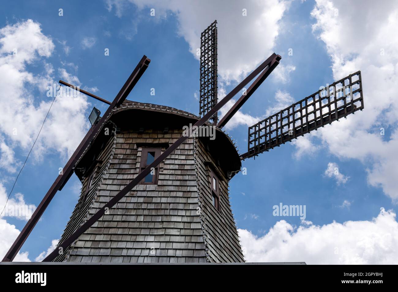 Old Vintage Wind Turbine On Blue Sky Background Stock Photo - Alamy