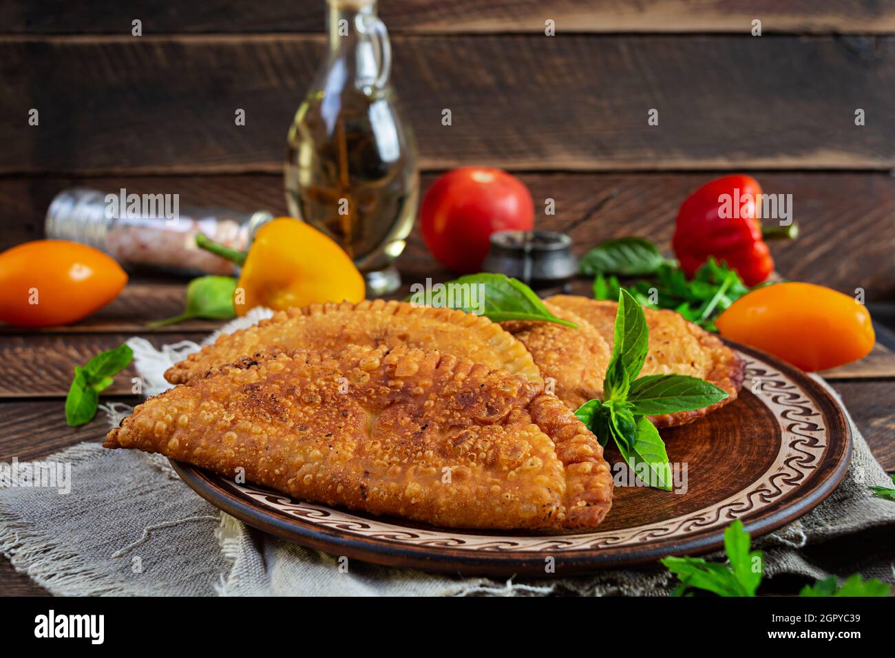 Traditional Crimean Tatar cuisine, chebureki with chicken meat. Fried ...