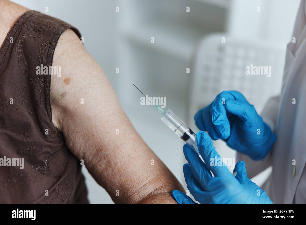 doctor makes an injection in the arm vaccine passport close-up Stock ...